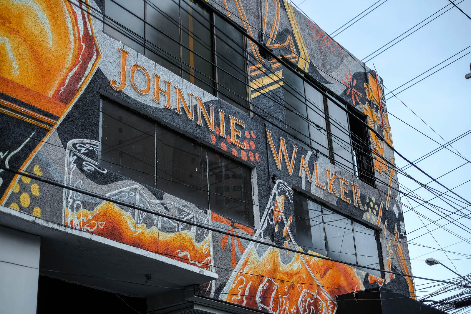 The Artist behind the Johnnie Walker Mural in Poblacion | PURVEYR